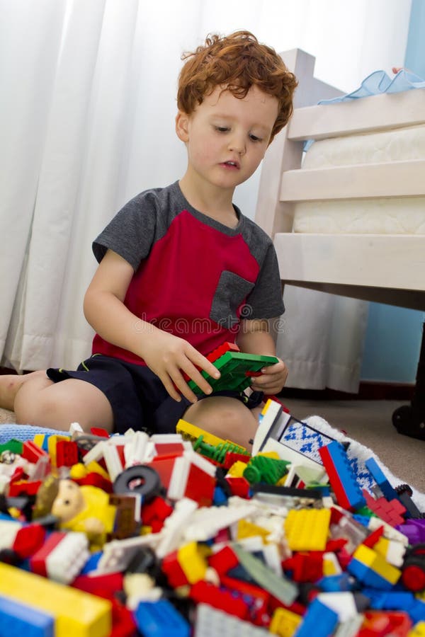 Young Boy Playing with Building Blocks Stock Photo - Image of colourful ...
