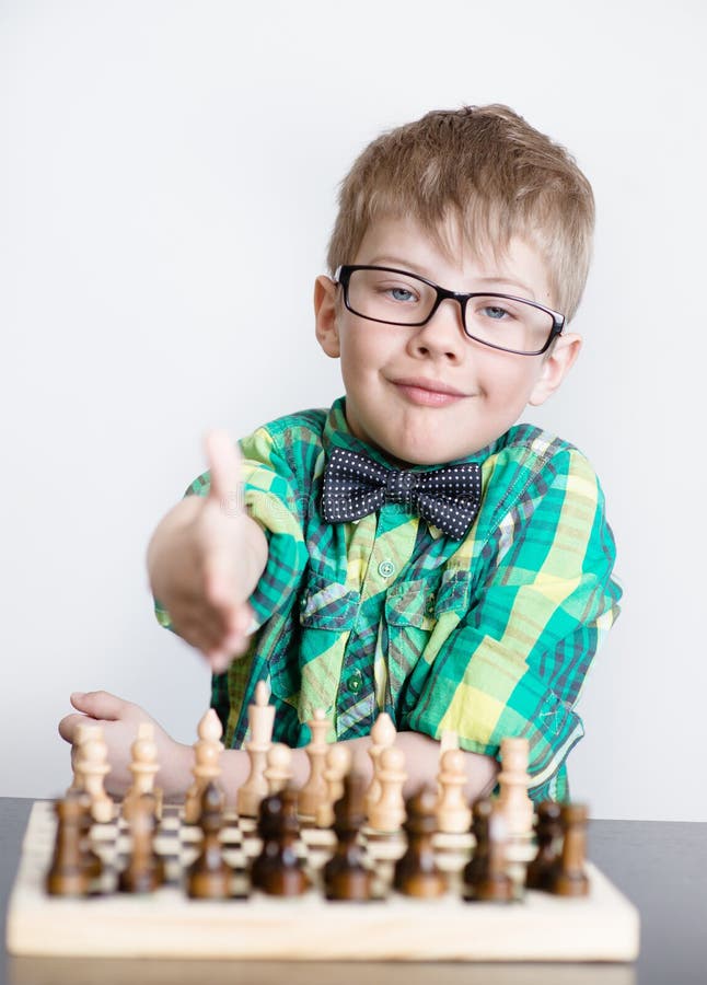 Young Boy Playing Chess, Offering Hand Stock Image - Image of ...
