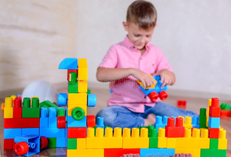 Young Boy Playing with Colorful Building Blocks Stock Photo - Image of ...