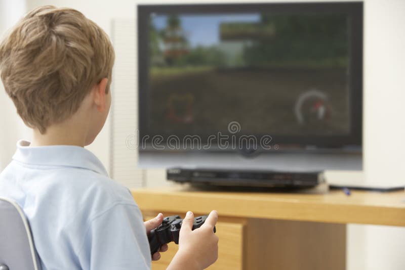 Young Boy Playing with Game Console Stock Photo - Image of playing ...