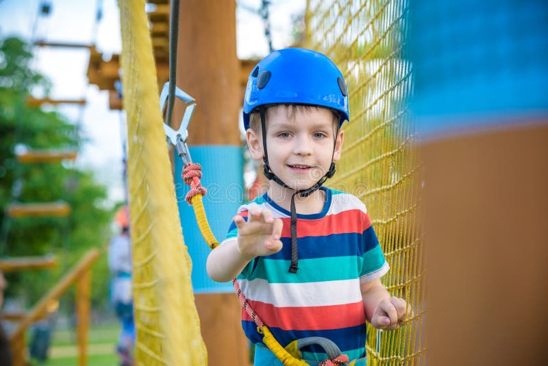 Young Boy Playing and Having Fun Doing Activities Outdoors. Happiness ...