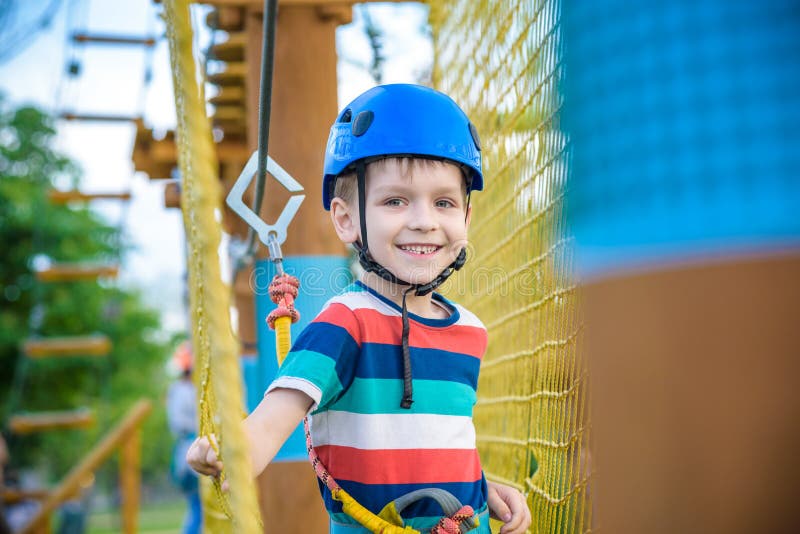Young Boy Playing and Having Fun Doing Activities Outdoors. Happiness ...
