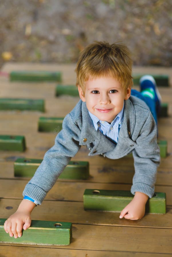 Young Boy Playing when Having Fun Doing Activities Outdoors. Stock ...
