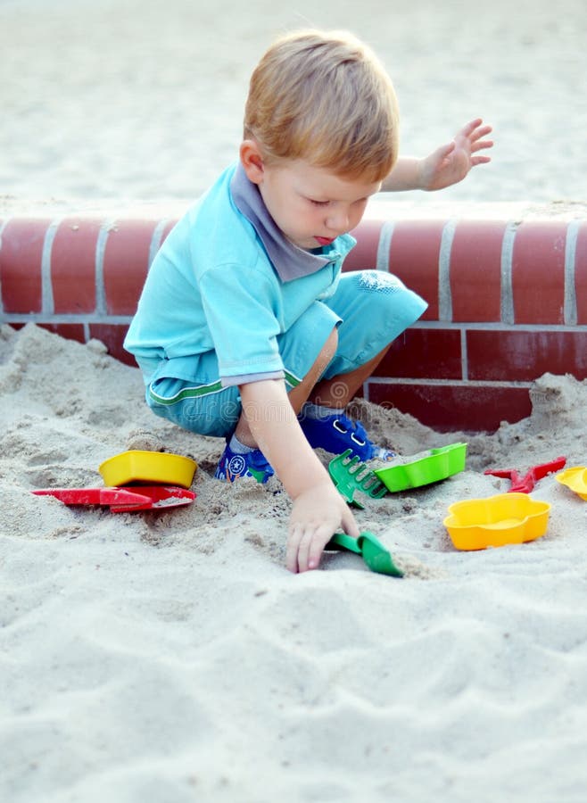 Playing in Sandbox stock photo. Image of childhood, digging - 7302388