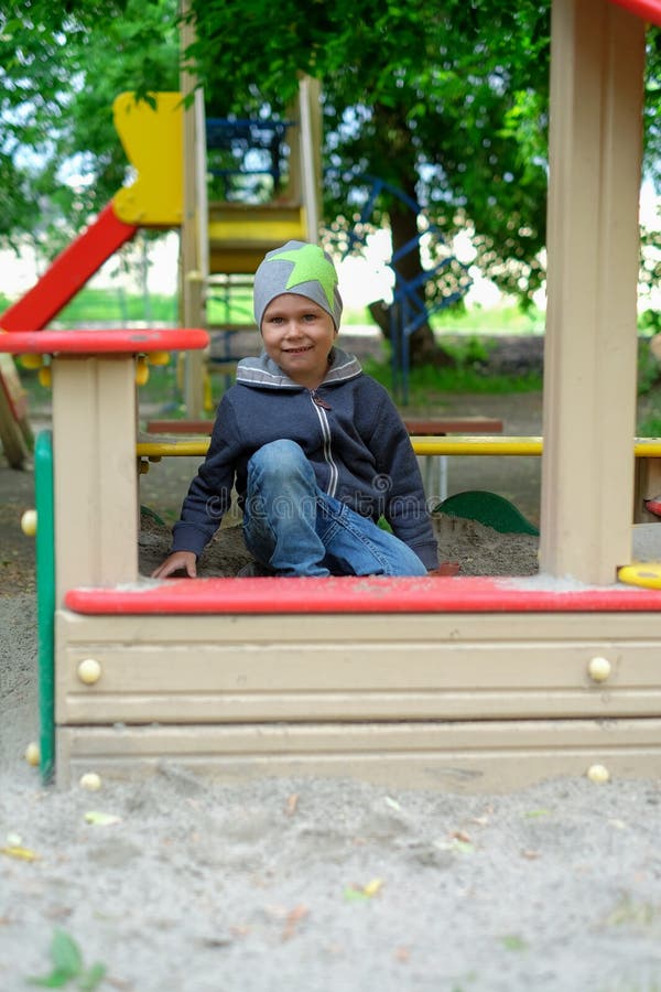 Young Boy Playing in the Sandbox Stock Image - Image of park, activity ...