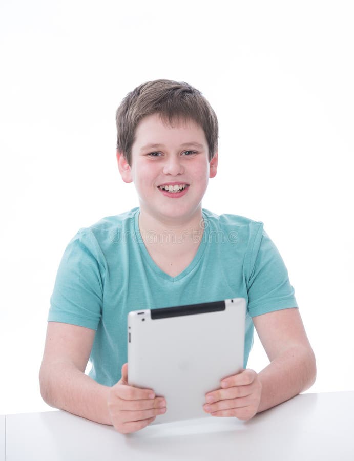 Young boy playing stock photo. Image of play, touch, device - 67381166