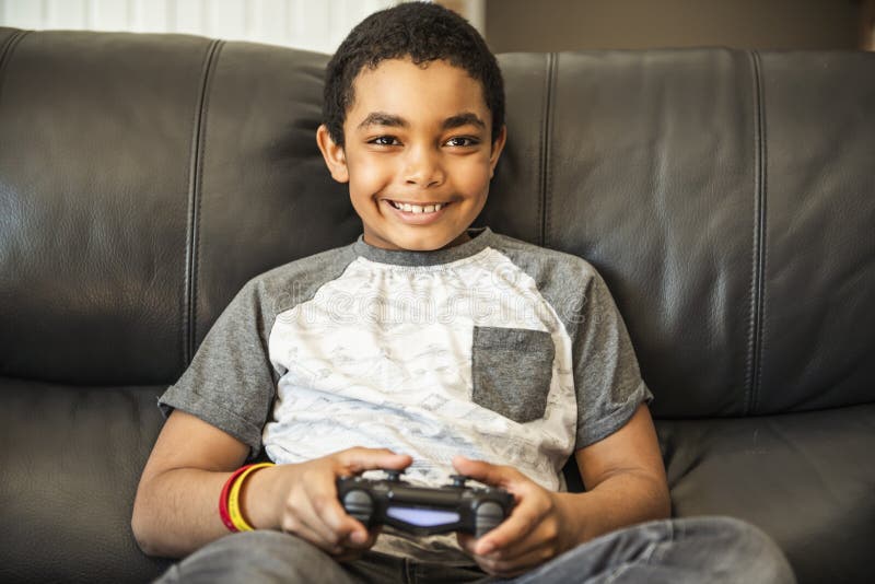 Young Boy Playing Video Game, at Home. Stock Image - Image of interior ...