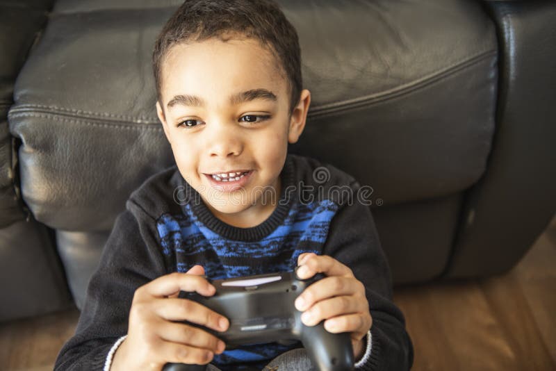 Young Boy Playing Video Game, at Home. Stock Image - Image of kids ...