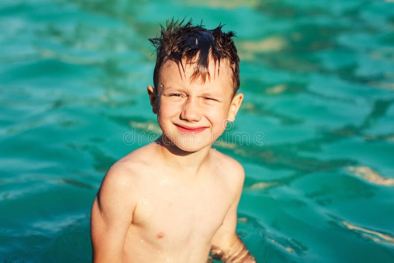 Young boy in the pool stock photo. Image of little, blue - 32567126