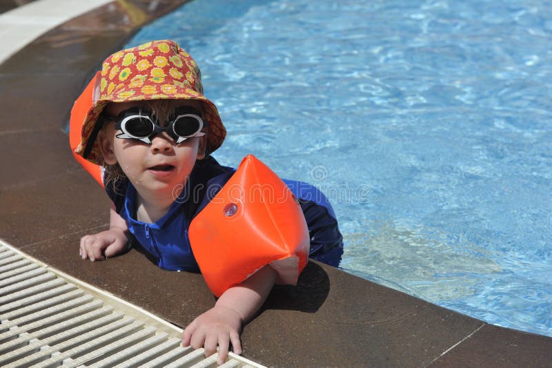 Young boy at poolside stock photo. Image of blue, leisure - 29047778