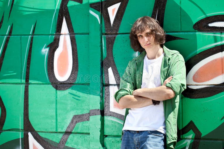 Young Boy Posing Against a Graffiti Wall Editorial Stock Image - Image ...