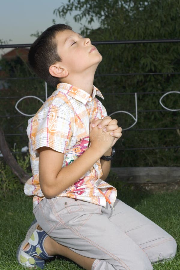 Young boy praying stock image. Image of beauty, diverse - 6064669