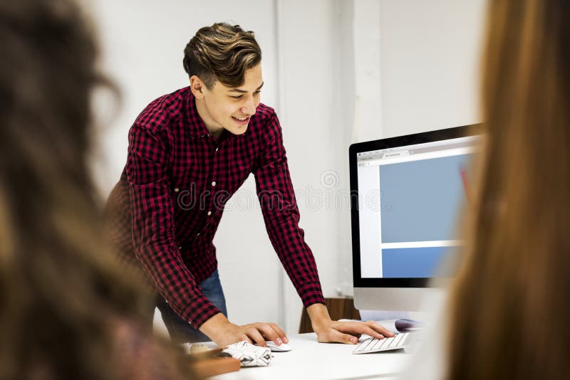 Young Boy Presenting a Project To the Team Stock Photo - Image of ...
