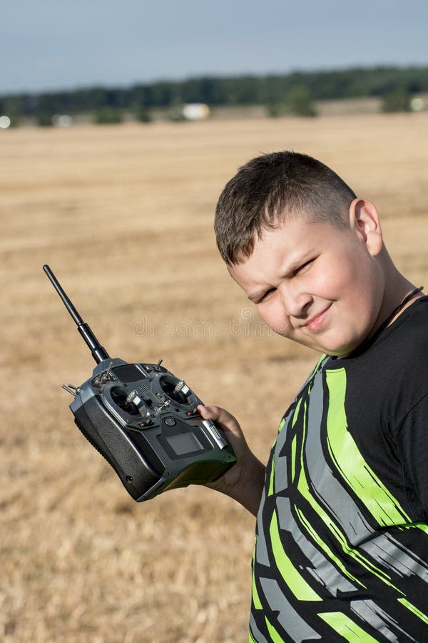 Young Boy with Radio Control Stock Photo - Image of airplane, construct ...
