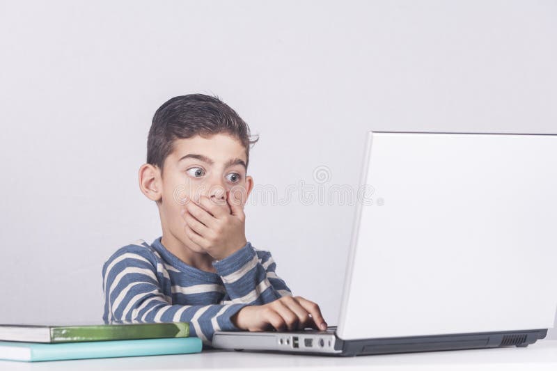 Young Boy Reacts while Using a Laptop Stock Image - Image of lifestyle ...