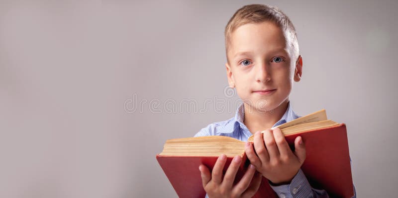Young Boy Reading Book As Symbol of Education and Self Development ...