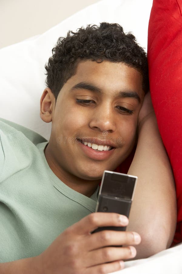 Young Boy Reading Text Message Stock Photo - Image of happy, twelve ...