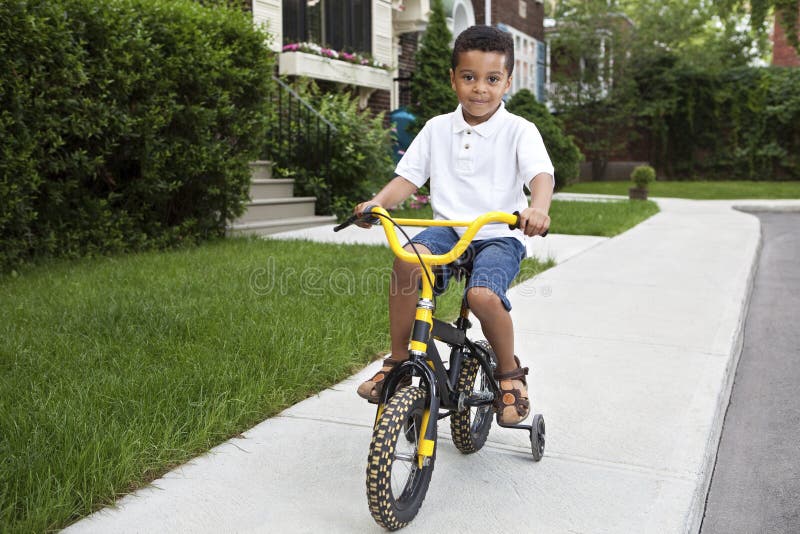 Young Boy Riding His Bicycle Stock Image - Image of neighbourhood ...