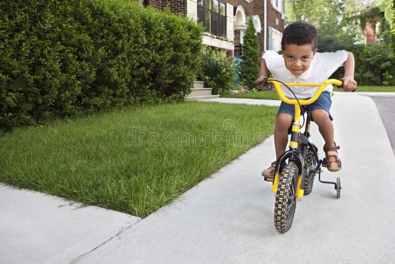 African American Family Parents & Boy Riding Bike Stock Photo - Image ...