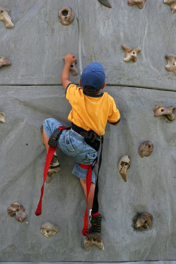 Young boy rock climbing stock photo. Image of safety, male - 2206042