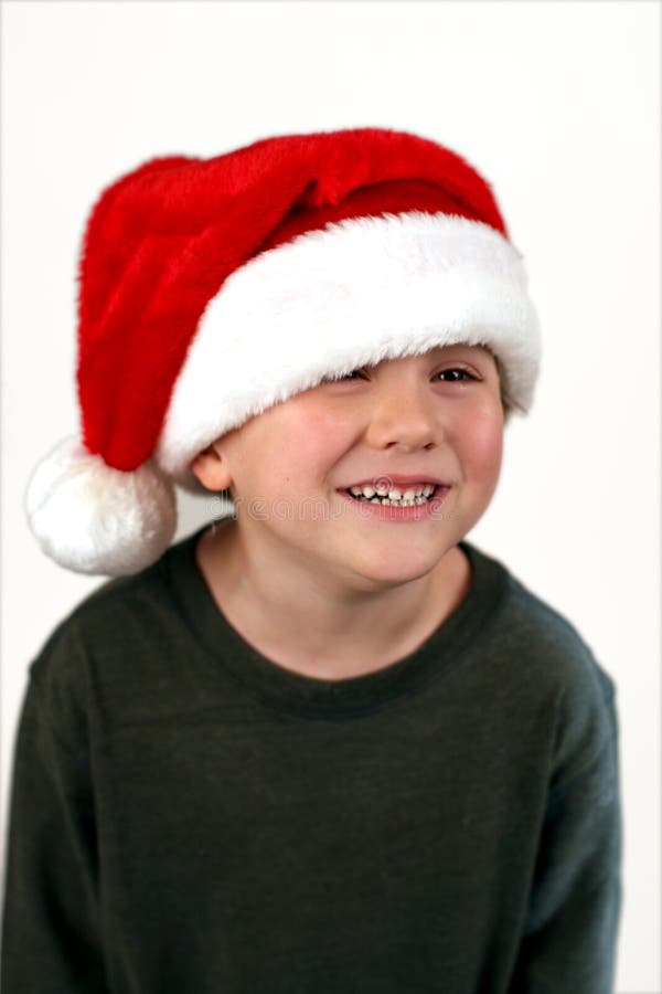 Young Boy in a Santa Hat Laugh Stock Image - Image of blond, smiling ...