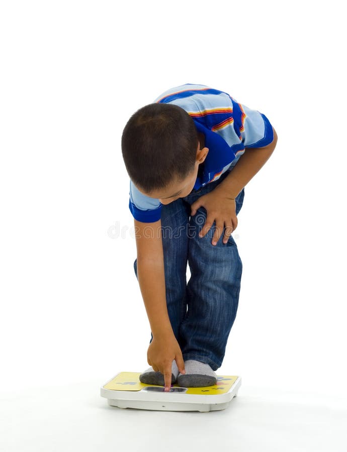 Young boy on scale stock photo. Image of isolated, loss - 13264990