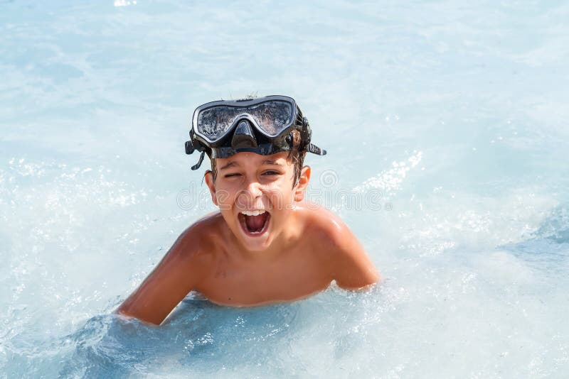 Young boy in the sea stock photo. Image of smile, leisure - 60414936