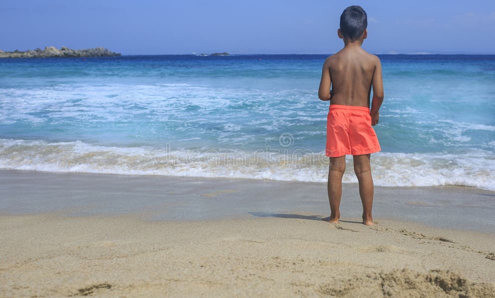 Young boy seeing the sea stock image. Image of male, meditating - 97198691