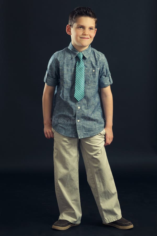 Young Boy in Shirt Tie and Khaki Pants Stock Photo - Image of shoes ...
