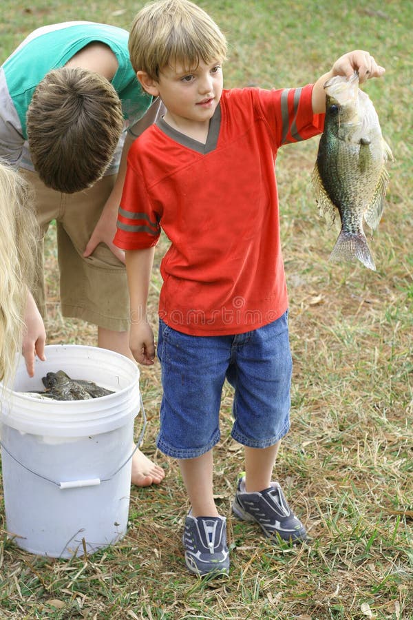 Young Boy Showing Off His Catch Picture. Image: 6239774