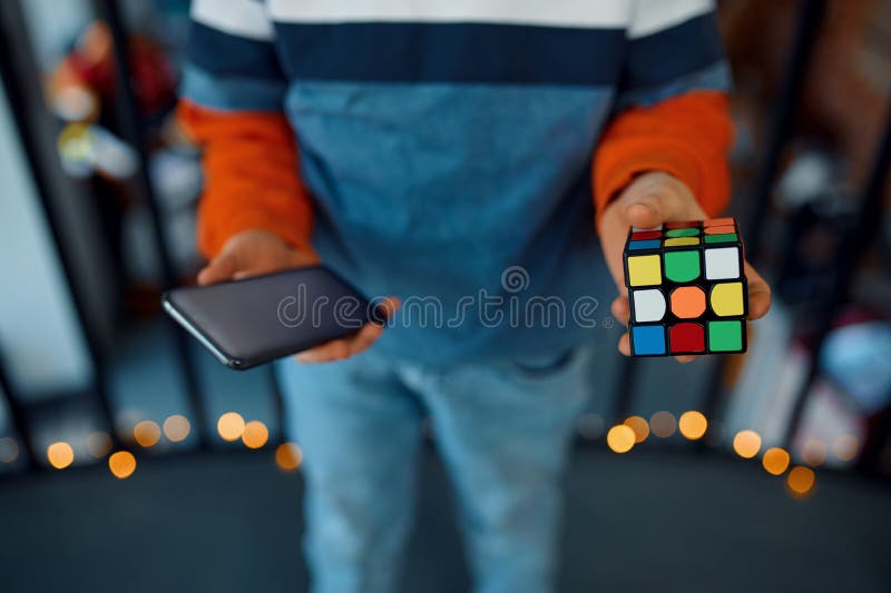 Young Boy Shows Puzzle Cube in His Hands Editorial Photography - Image ...