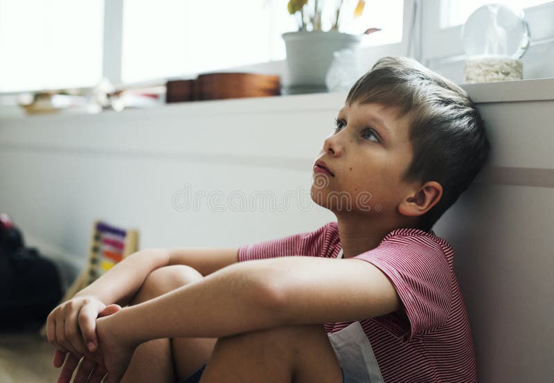Young Boy Sitting with Depression Stock Image - Image of face, despair ...