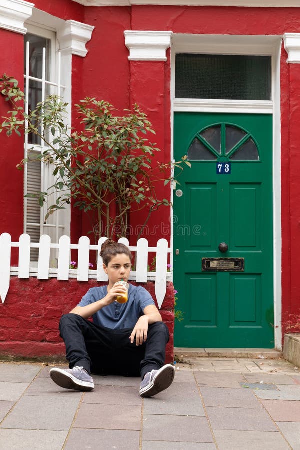Young Boy is Sitting Outside the Home Stock Image - Image of outdoor ...