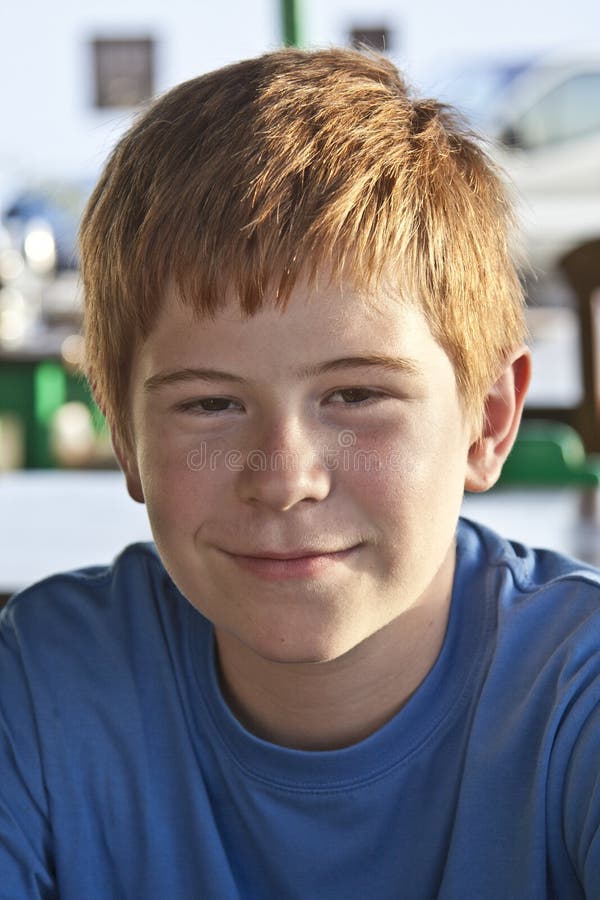 Young Boy is Sitting on a Table in a Restaurant Stock Image - Image of ...