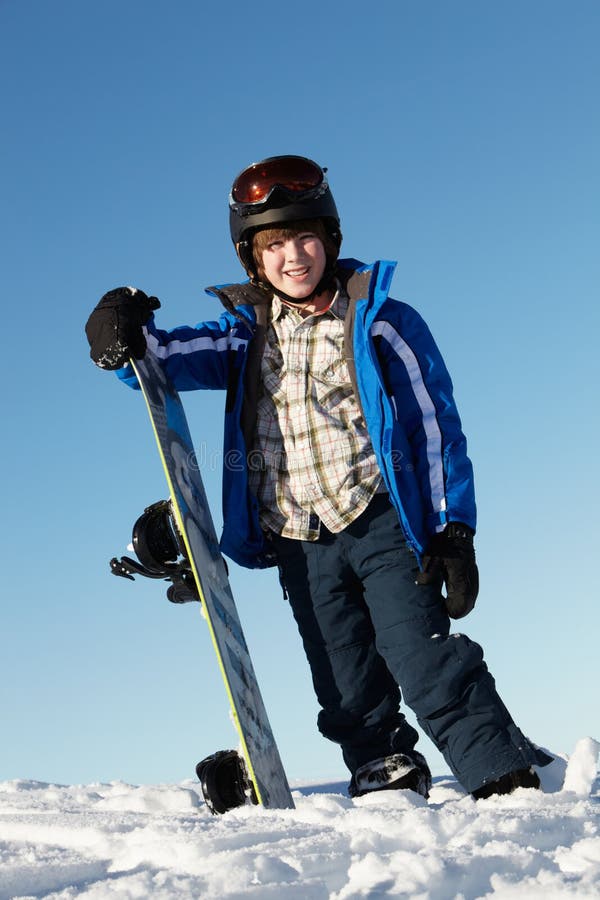 Young Boy with Snowboard stock image. Image of snowboarder - 24475015
