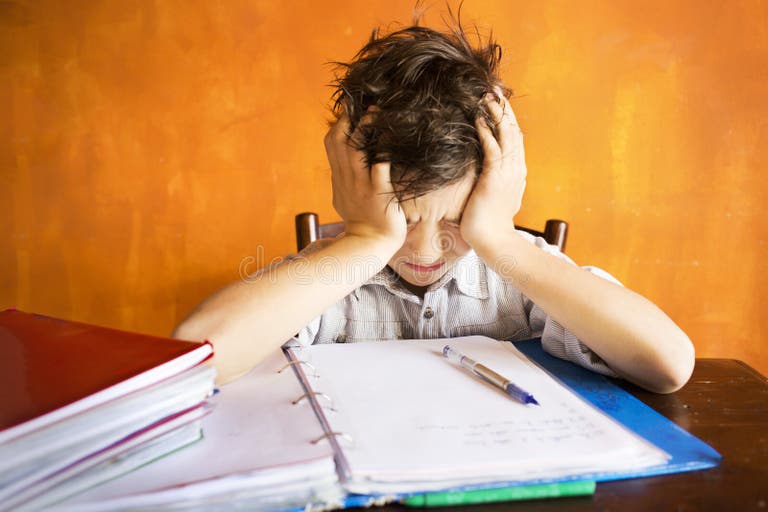 A Young Boy Stressed on Homework Stock Image - Image of books, hope ...