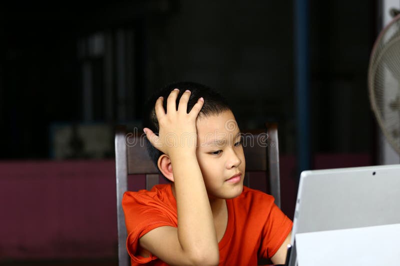 Young Boy Struggling with Online Learning at Home Stock Image - Image ...