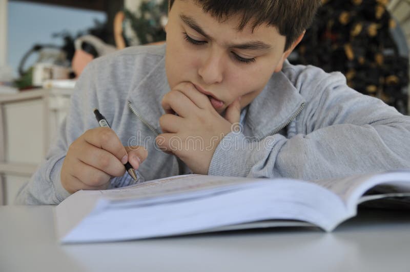Young boy studying stock image. Image of language, lifestyle - 11195463 Young boy studying stock image. Image of language, lifestyle - 11195463