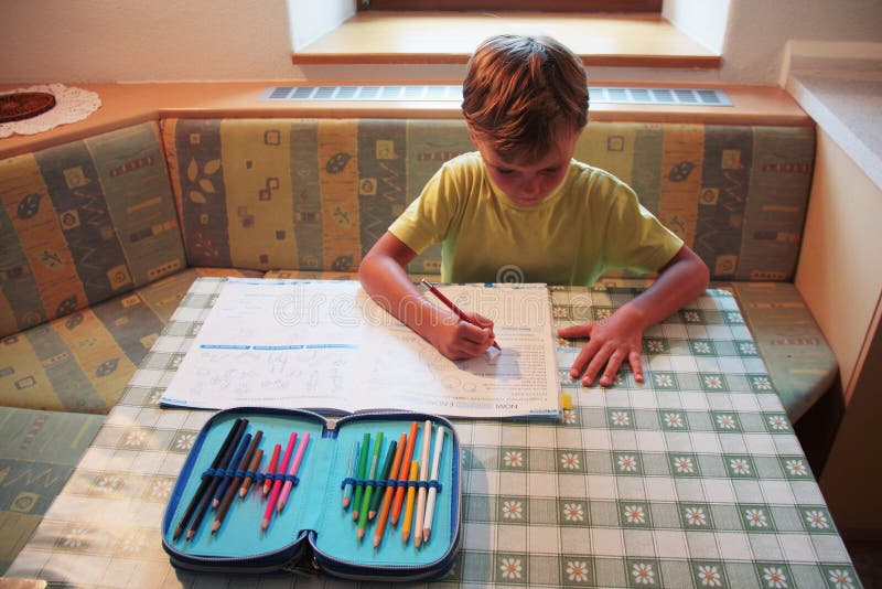 Young boy studying at home stock photo. Image of learn - 76313622