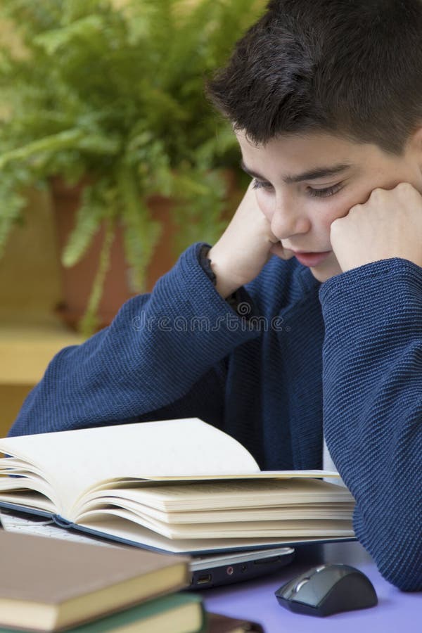 Boy studying book stock photo. Image of desktop, notebook - 97241612