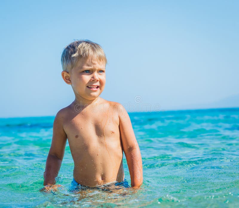 Young Boy Swimming In Sea Stock Photo - Image: 29039110