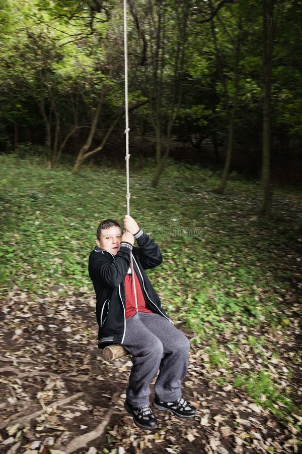 Young Boy Swing on the Rope Stock Photo - Image of play, relax: 60754074