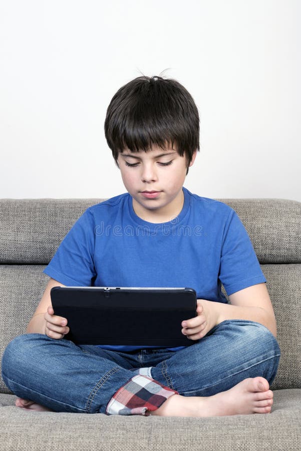 Young Boy and a Tablet Digital Stock Photo - Image of internet, blue ...