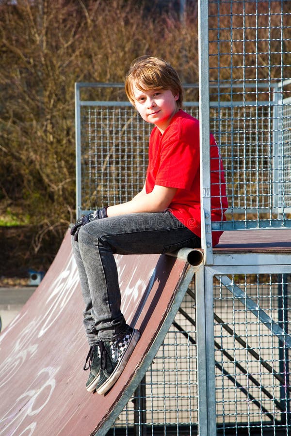 Young boy takes a rest stock photo. Image of motion, play - 14315008