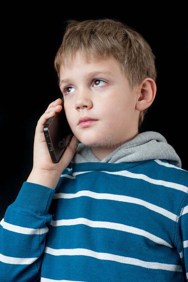 Young Boy Talking on Mobile Phone Stock Photo - Image of beautiful ...