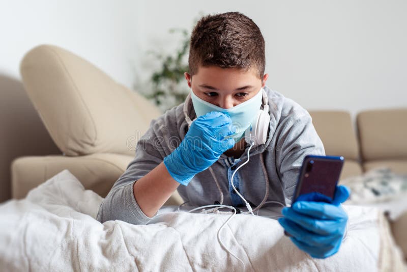 The Boy Talks on the Phone in Home Isolation. Stock Photo - Image of ...