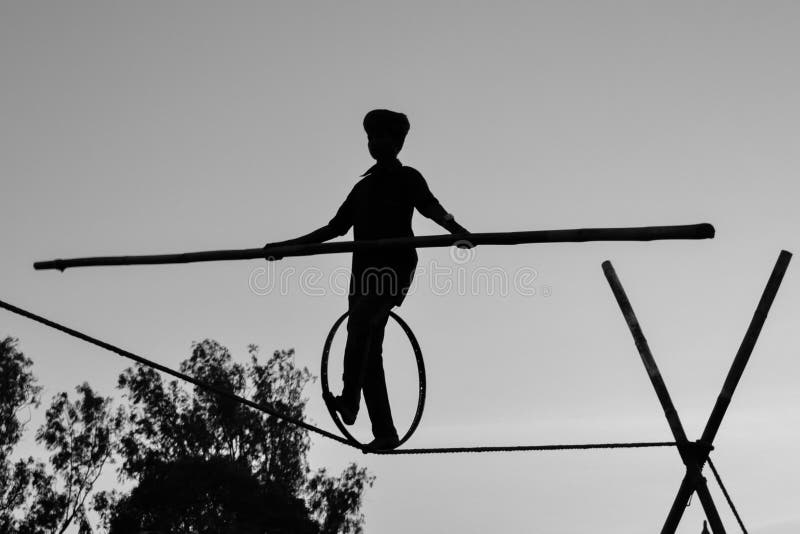 Young Boy Tightrope Walking, Slacklining, Funambulism, Rope Balancing ...