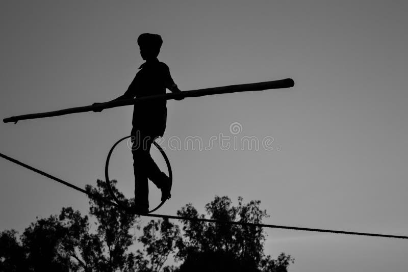 Young Boy Tightrope Walking, Slacklining, Funambulism, Rope Balancing ...