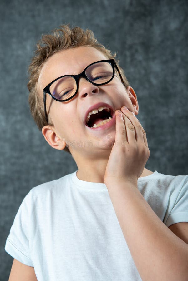 Young boy with toothache stock image. Image of dental - 175912211