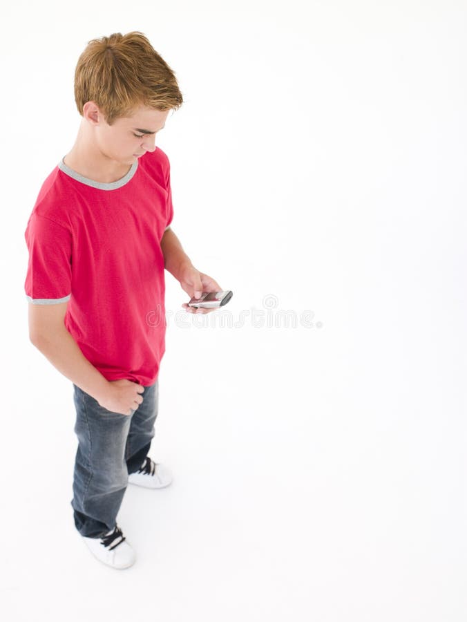 Young Boy Using Cellular Phone Stock Image - Image of smile, smiling ...